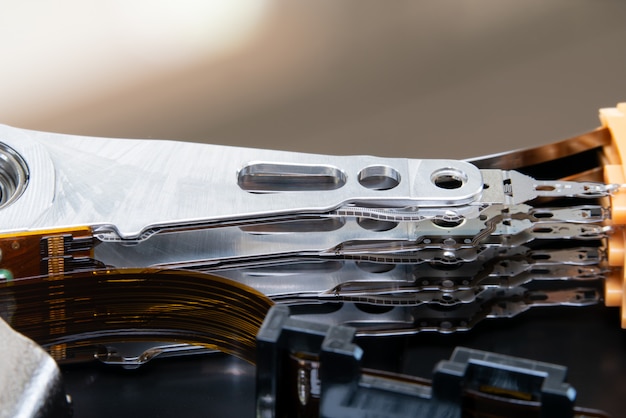 Premium Photo | Actuator arm opened hard disk drive hdd. Premium Photo | Actuator arm opened hard disk drive hdd.