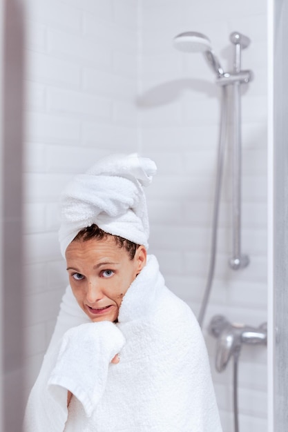 Premium Photo An Adult Caucasian Woman Comes Out Of The Shower After