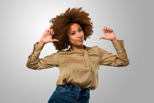 Premium Photo | Afro woman pointing herself Premium Photo | Afro woman pointing herself