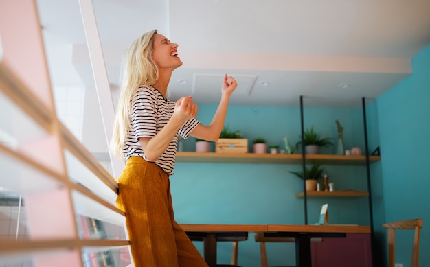 Premium Photo Attractive Young Happy Cheerful Woman Enjoying Her Time