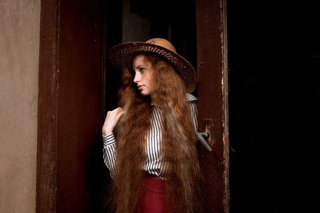 Premium Photo Attractive Young Red Haired Model With Long Wavy Hair