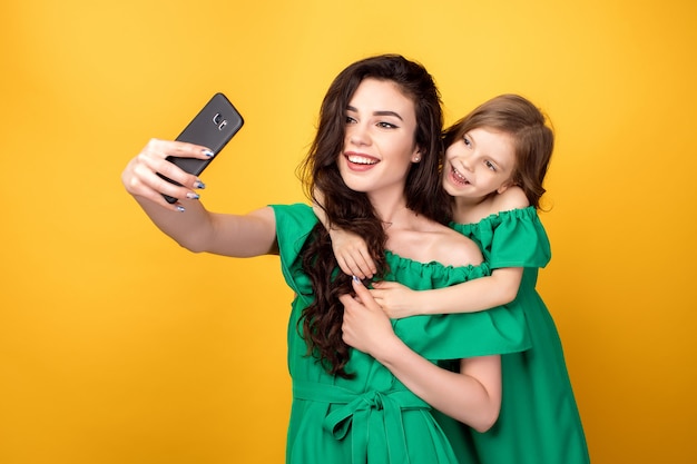Premium Photo Awesome Mother With Daughter Taking Selfie