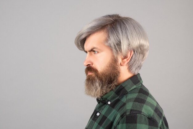 Premium Photo | Bearded man. barbershop procedures. side view portrait. Premium Photo | Bearded man. barbershop procedures. side view portrait.
