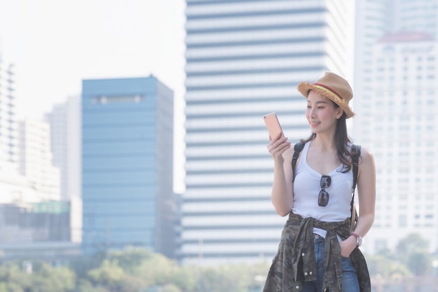 Premium Photo | Beautiful asian solo tourist woman smiling and looking ... Premium Photo | Beautiful asian solo tourist woman smiling and looking ...