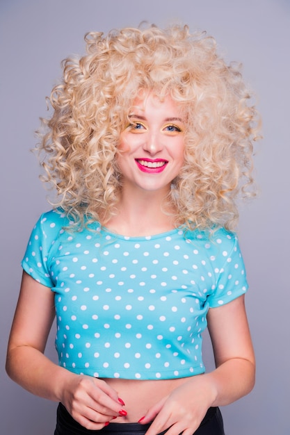Premium Photo Beautiful Retro Style Blonde Girl With Voluminous Curly