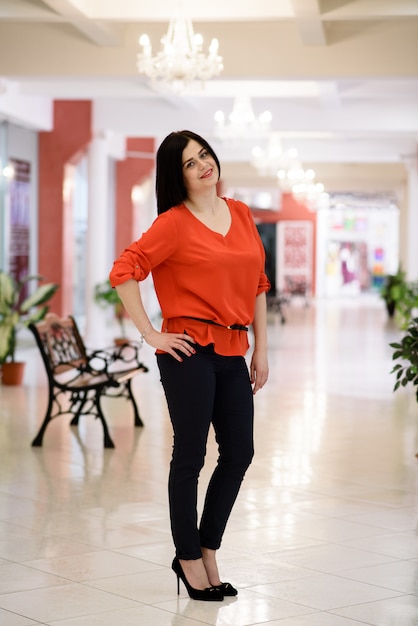 Premium Photo A Beautiful Woman In A Red Blouse