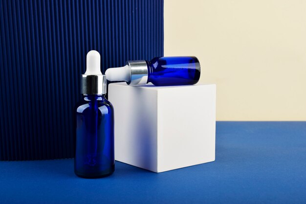 Premium Photo Blue Bottle With Hyaluronic Acid