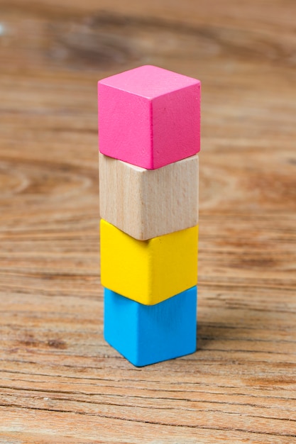 Free Photo | Building blocks on wooden background,colorful wooden ... Free Photo | Building blocks on wooden background,colorful wooden ...