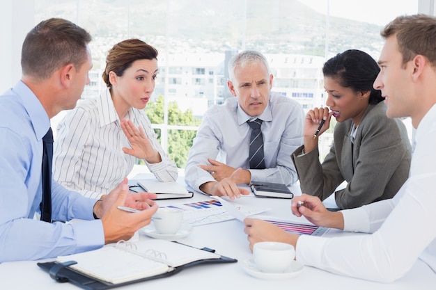Premium Photo | Business team analyzing the graphs Premium Photo | Business team analyzing the graphs