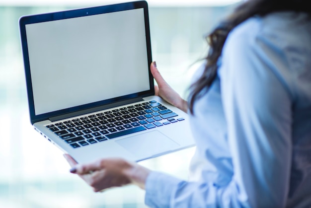 Free Photo | Business woman holding laptop Free Photo | Business woman holding laptop