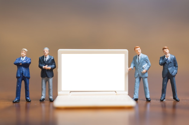 Premium Photo | Businessman presenting on white screen computer laptop Premium Photo | Businessman presenting on white screen computer laptop
