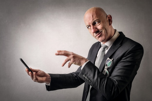 Premium Photo | Businessman trying to decide Premium Photo | Businessman trying to decide