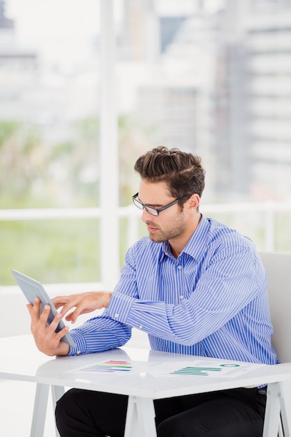 Premium Photo | Businessman using digital tablet Premium Photo | Businessman using digital tablet
