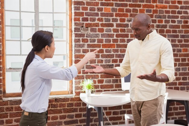 Premium Photo | Casual business colleagues having an argument Premium Photo | Casual business colleagues having an argument