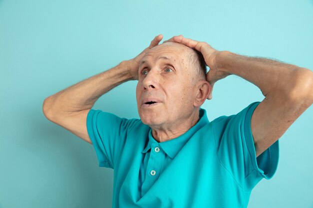 Free Photo | Caucasian senior man's portrait isolated on blue wall Free Photo | Caucasian senior man's portrait isolated on blue wall