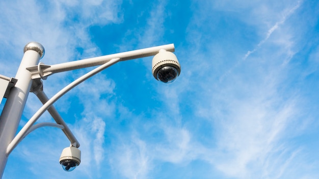 Premium Photo | Cctv camera with blue sky Premium Photo | Cctv camera with blue sky