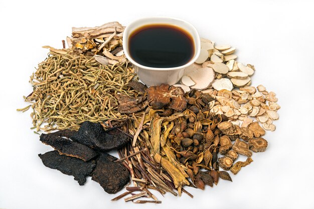 Chinese traditional herbal medicine and organic herbs | Premium Photo Chinese traditional herbal medicine and organic herbs | Premium Photo
