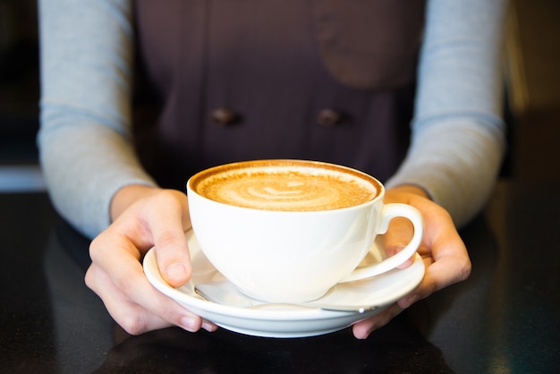 Free Photo | Close-up of female hands holding coffee cup Free Photo | Close-up of female hands holding coffee cup