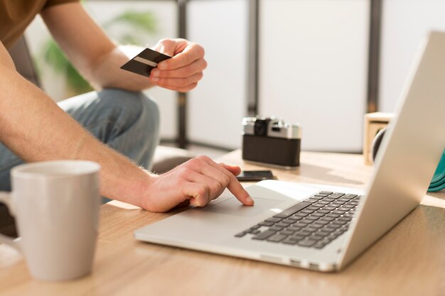 Premium Photo | Close-up man using credit card Premium Photo | Close-up man using credit card