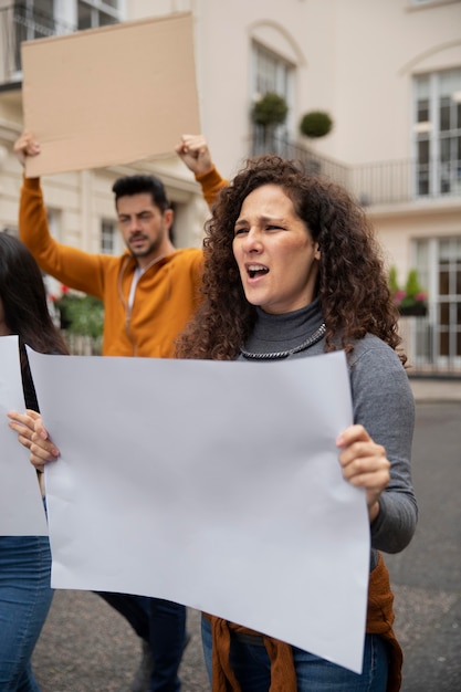 Free Photo | Close up people holding placards Free Photo | Close up people holding placards