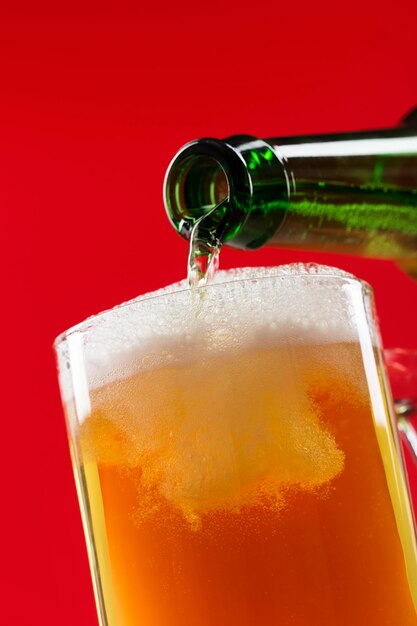 Premium Photo Close Up Pouring Beer In Glass