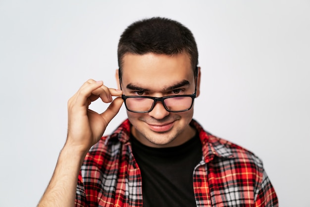 Premium Photo Close Up Of Young Trendy Guy With Glasses Smiling A Portrait Of Clever Man In T