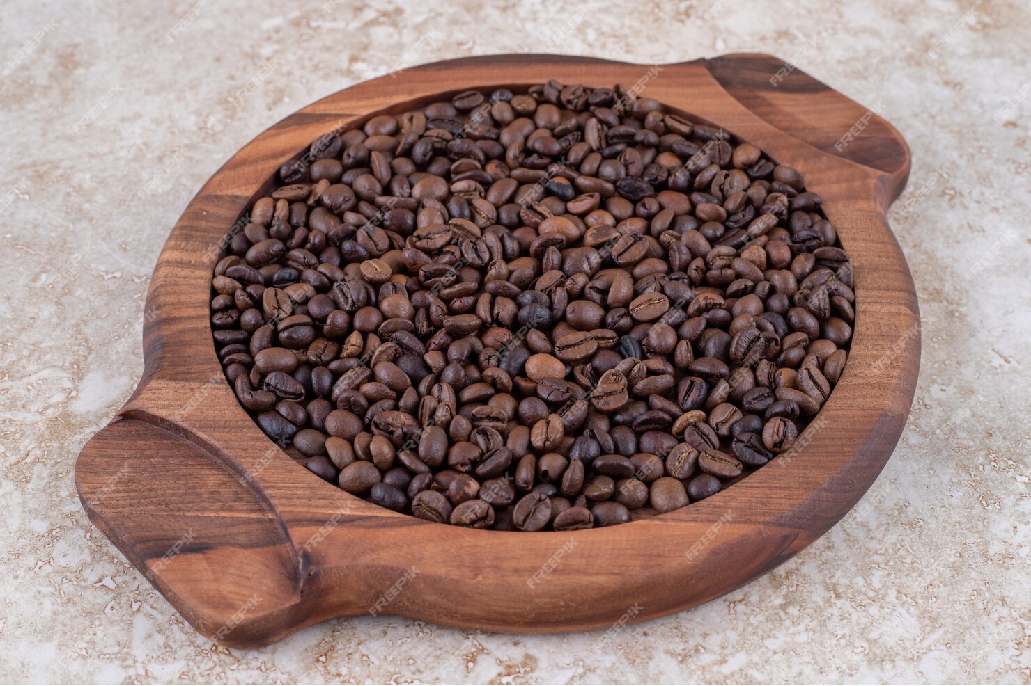 Free Photo | Coffee beans piled on a wooden tray Free Photo | Coffee beans piled on a wooden tray