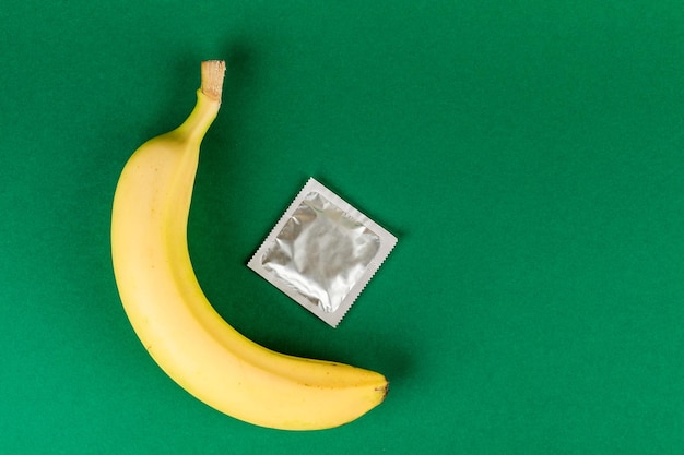 Premium Photo A Condom And A Banana Safe Sex Sex Toy Contraceptive