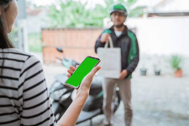 Delivery man delivering food | Premium Photo Delivery man delivering food | Premium Photo