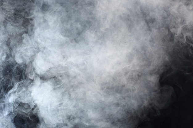 Premium Photo | Dense fluffy puffs of white smoke and fog on black ... Premium Photo | Dense fluffy puffs of white smoke and fog on black ...