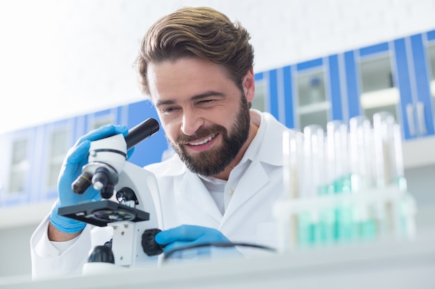 Premium Photo | Expected results. cheerful smart professional scientist ... Premium Photo | Expected results. cheerful smart professional scientist ...