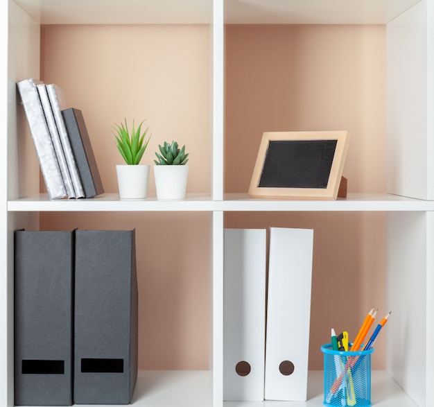Premium Photo | File folders, standing on the shelves at office Premium Photo | File folders, standing on the shelves at office