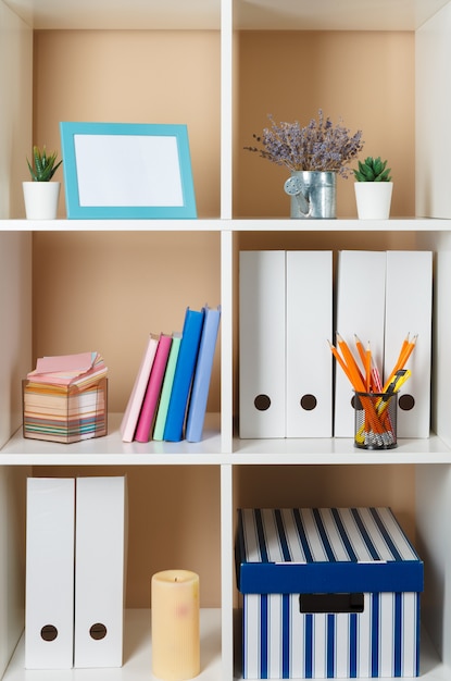 Premium Photo | File folders, standing on the shelves at office Premium Photo | File folders, standing on the shelves at office