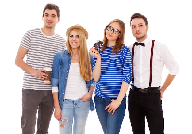 Premium Photo | Four stylish young people on white background Premium Photo | Four stylish young people on white background
