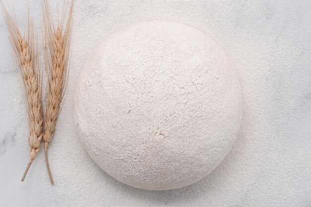 Premium Photo | Fresh raw homemade yeast dough resting on marble table ... Premium Photo | Fresh raw homemade yeast dough resting on marble table ...