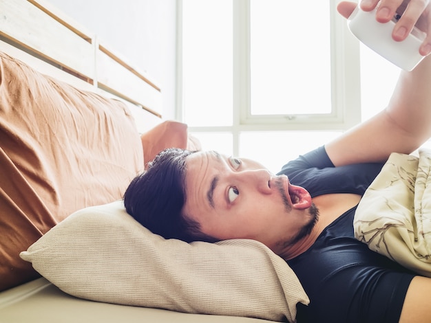 Premium Photo | Funny face asian man shocked as he wakes up late for an ... Premium Photo | Funny face asian man shocked as he wakes up late for an ...
