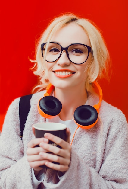 Premium Photo | Girl smiling while listening to music Premium Photo | Girl smiling while listening to music