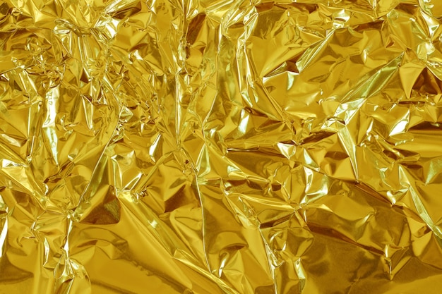 Premium Photo Gold Foil Shiny Texture Background