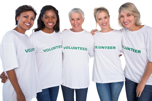 Premium Photo | Group of female volunteers smiling at camera Premium Photo | Group of female volunteers smiling at camera
