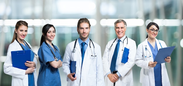 Premium Photo | Group of smiling doctors Premium Photo | Group of smiling doctors