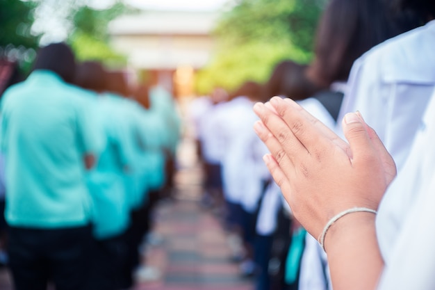 Premium Photo | Hand of asian students pay respect to the buddha Premium Photo | Hand of asian students pay respect to the buddha
