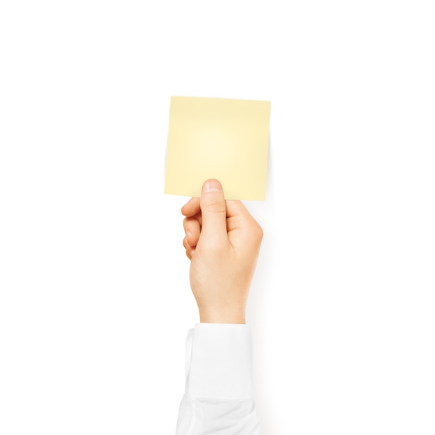 Premium Photo | Hand holding square blank yellow sticker Premium Photo | Hand holding square blank yellow sticker
