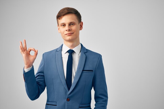 Premium Photo Handsome Business Man In A Suit And Gesturing With His