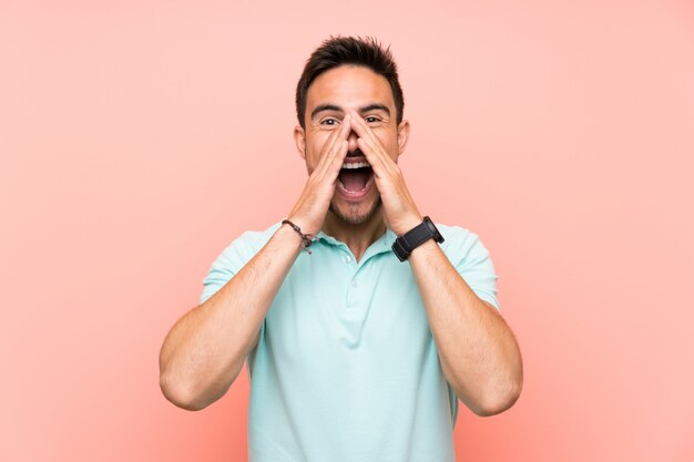Premium Photo | Handsome young man over isolated background shouting ... Premium Photo | Handsome young man over isolated background shouting ...