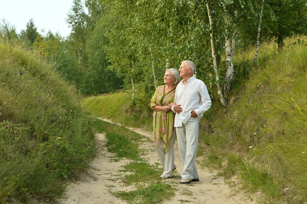 Premium Photo Happy Portrait Of Senior Couple In Forest