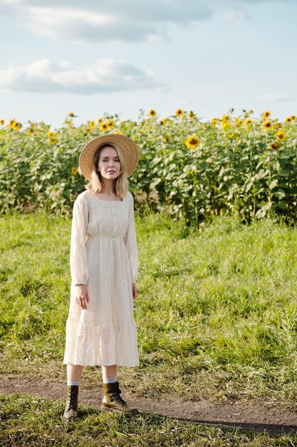 Premium Photo Happy Young Blond Woman In Hat And White Romantic Dress