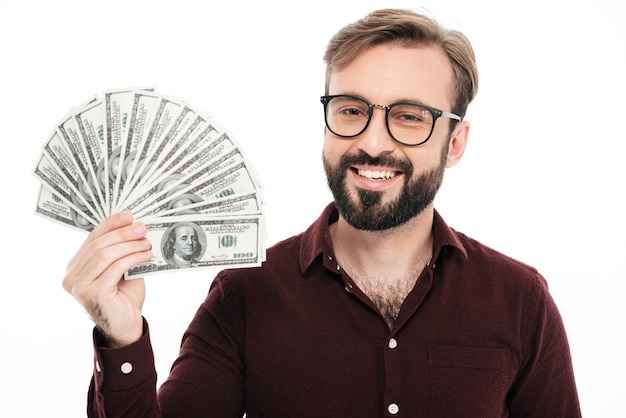 Free Photo | Happy young man holding money. Free Photo | Happy young man holding money.