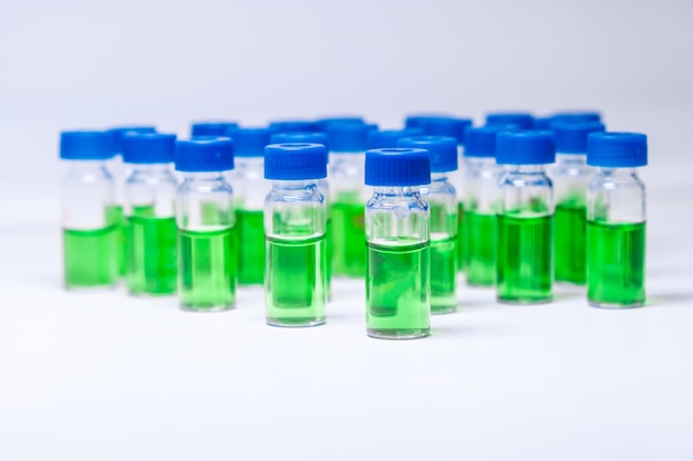 Premium Photo | Hplc vials with green sample of plant extracts ... Premium Photo | Hplc vials with green sample of plant extracts ...