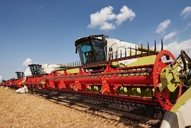 Premium Photo | Large combine harvesters parked in agriculturic field ... Premium Photo | Large combine harvesters parked in agriculturic field ...
