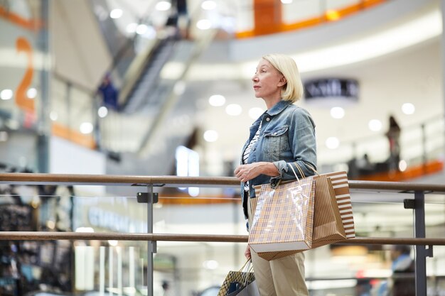 Premium Photo | Lost woman in big shopping mall Premium Photo | Lost woman in big shopping mall